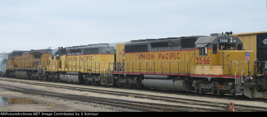 UP SD40-2s and a Dash 8 at St. Paul MN Belt Yard in May 2012.